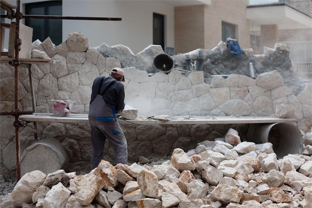 Canteros, colocación de piedra en Arteixo